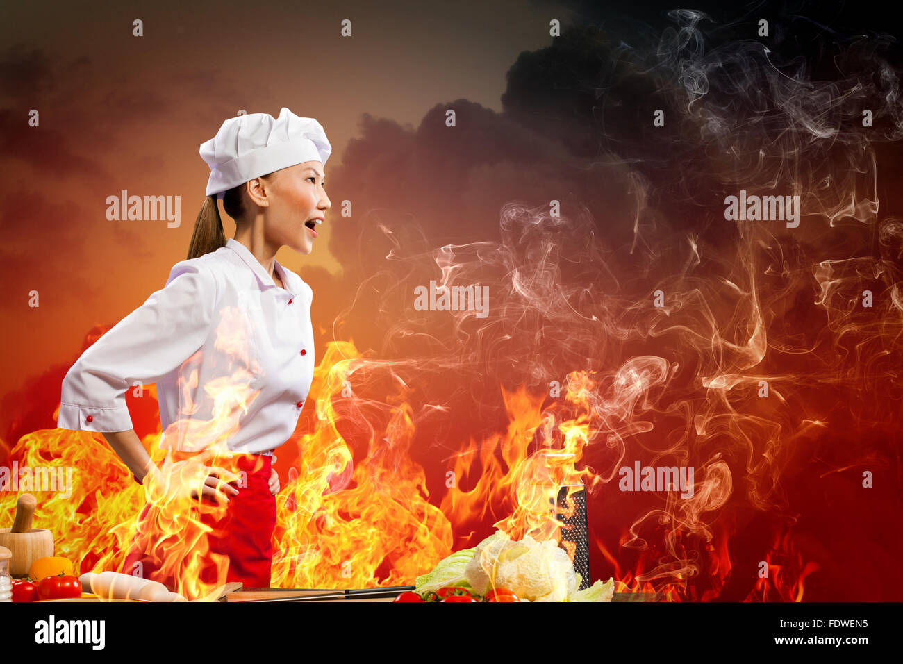 Asian female cook in anger against color background with shine effects ...