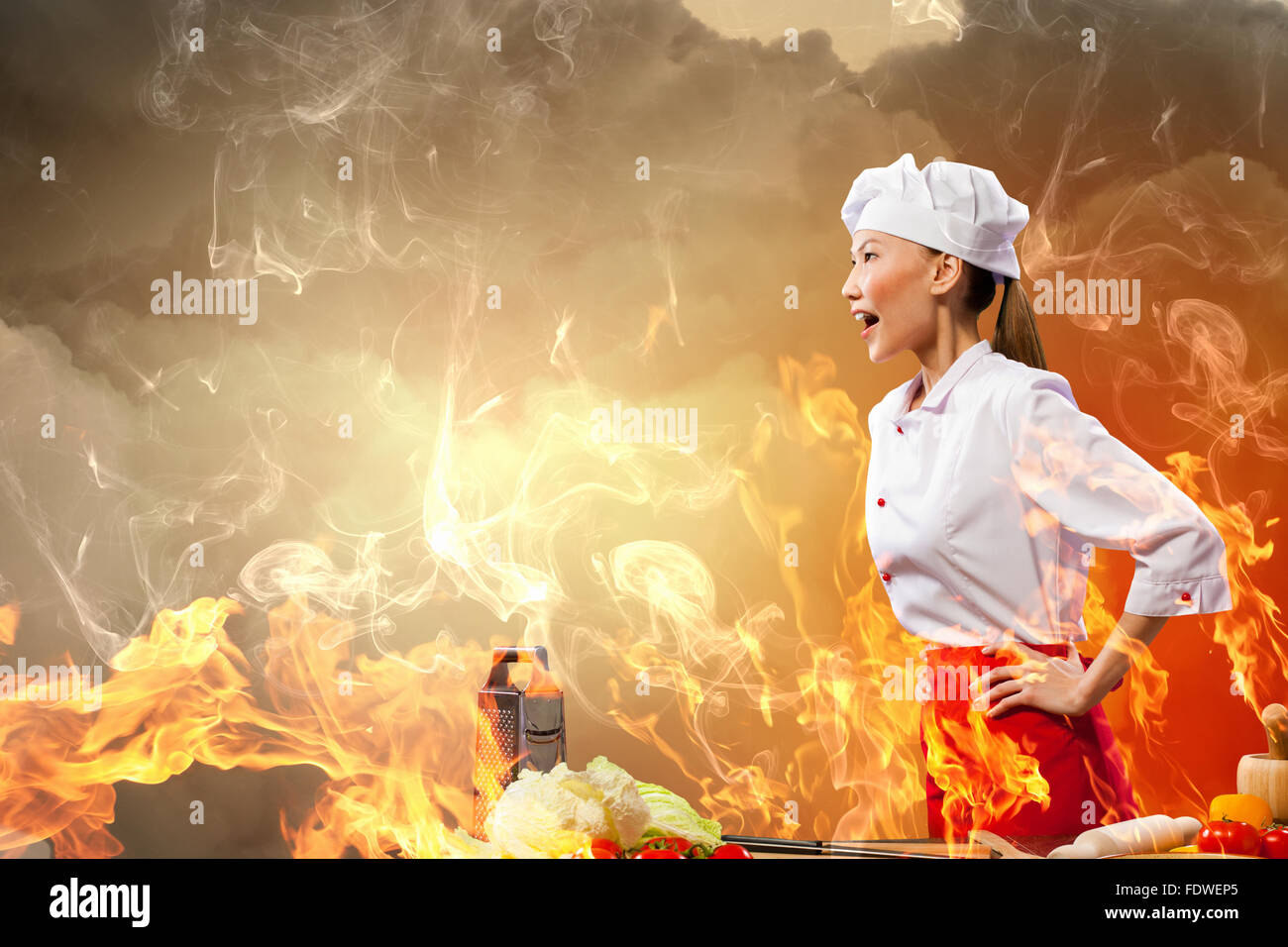 Asian female cook in anger against color background with shine effects ...