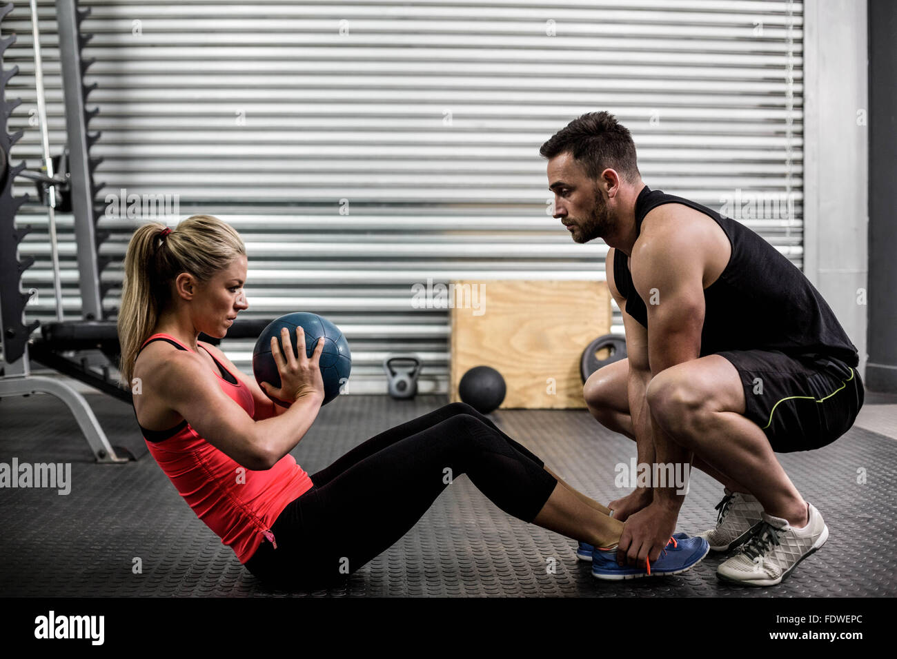 Fit couple doing abdominal ball exercise Stock Photo - Alamy