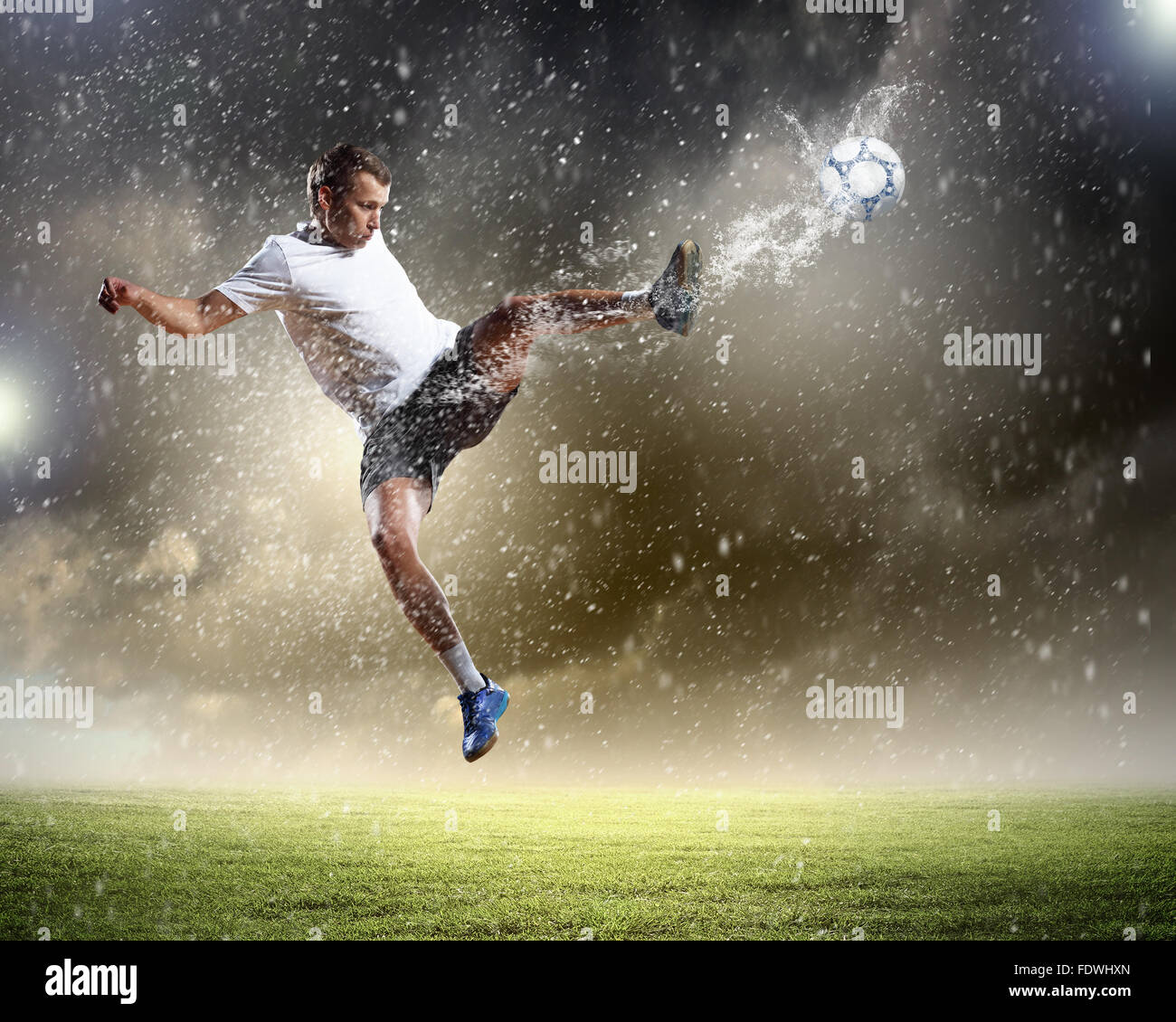 football player in white shirt striking the at the stadium under the ...