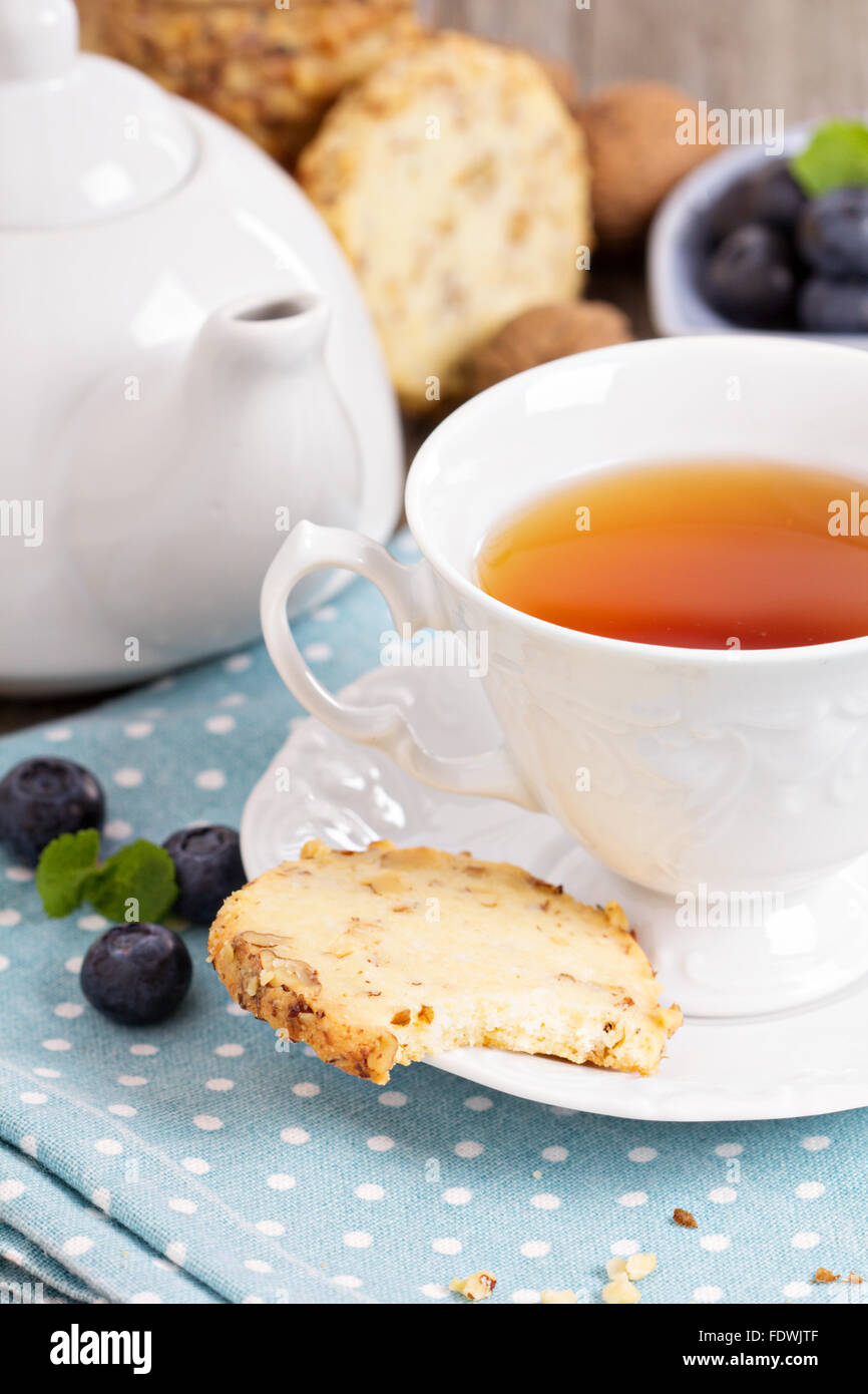 Walnut cookies with a cup of tea Stock Photo - Alamy