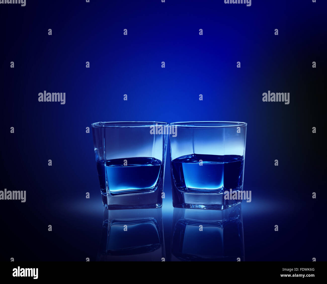 Image of two glasses of blue liquid Stock Photo - Alamy