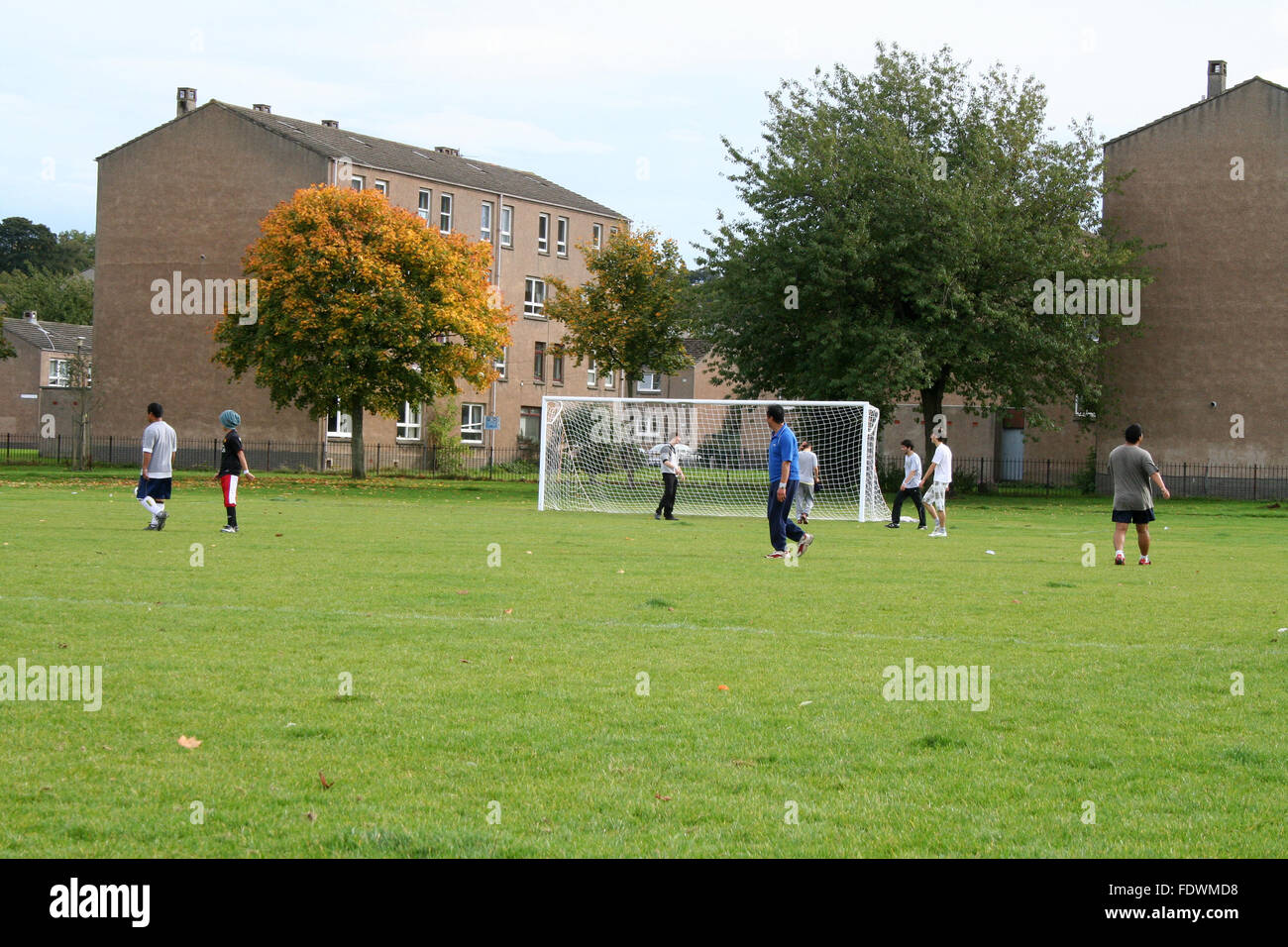 Playing a football match outside Stock Photo - Alamy