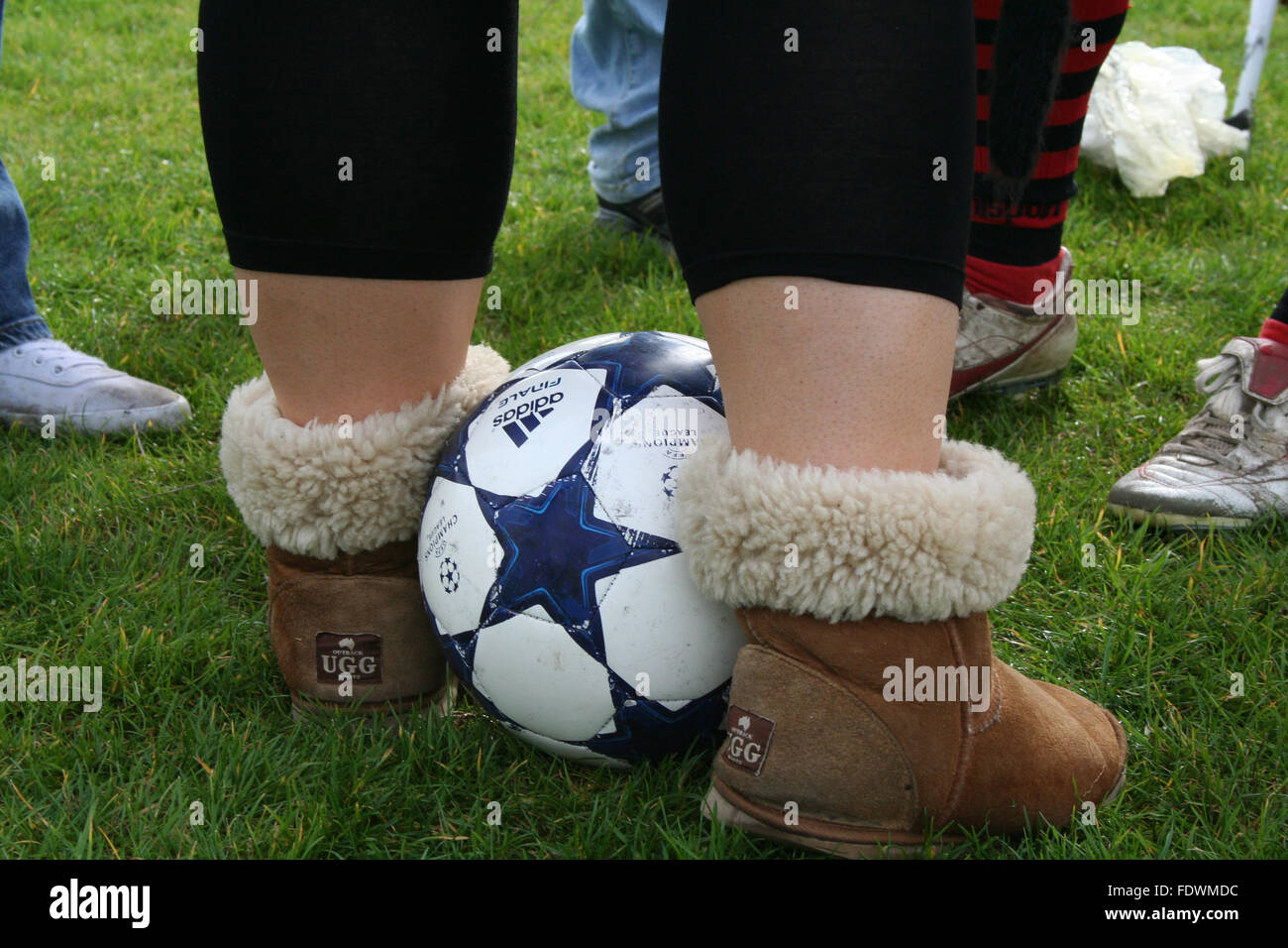 Playing a football match outside Stock Photo - Alamy
