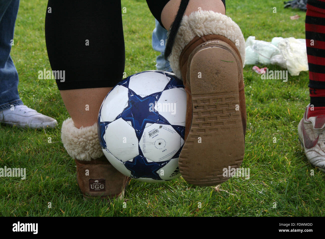 Playing a football match outside Stock Photo - Alamy
