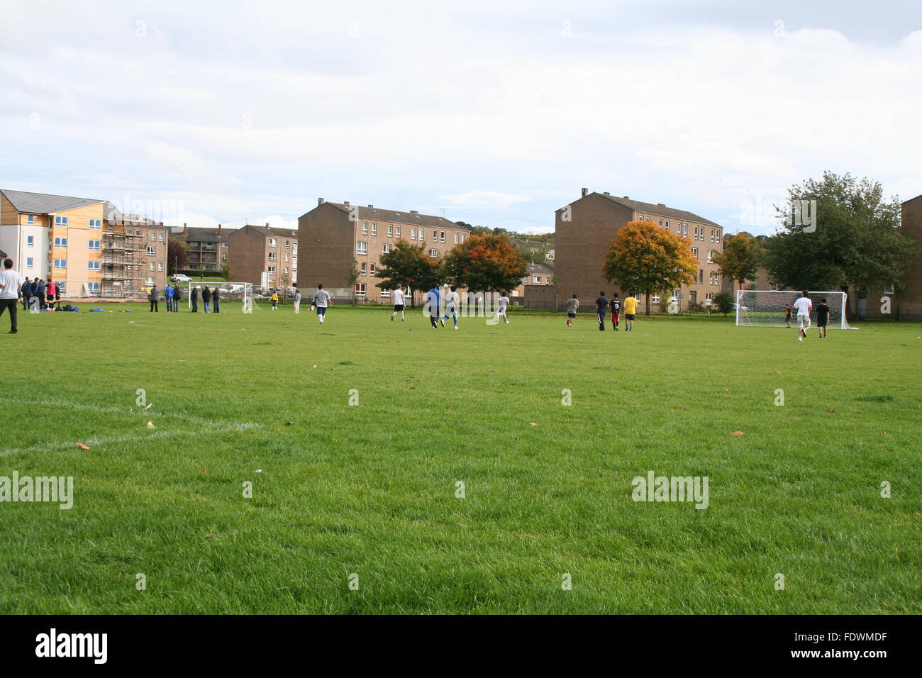 Playing a football match outside Stock Photo - Alamy