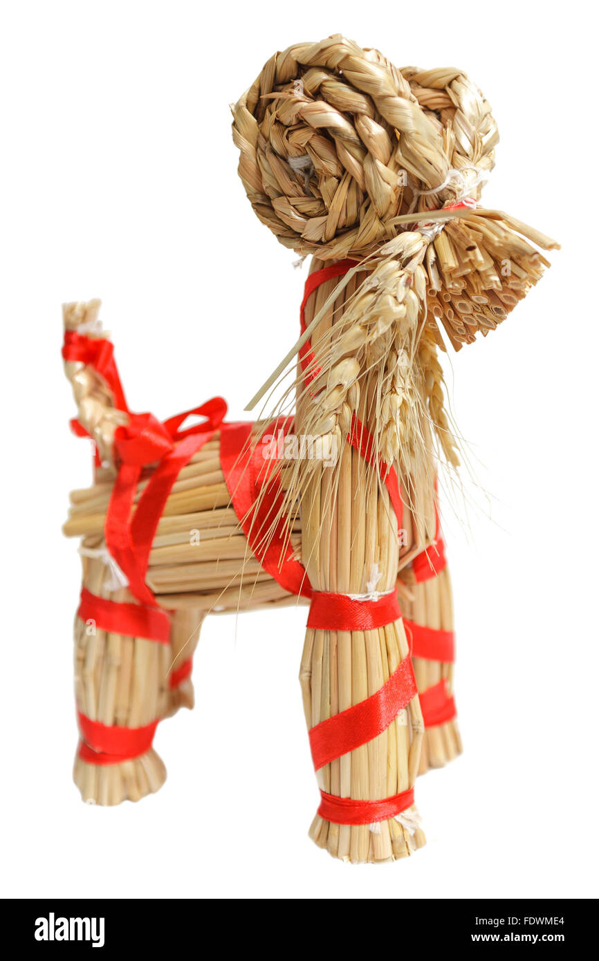 Traditional Swedish Christmas goat made out of straw isolated on white ...