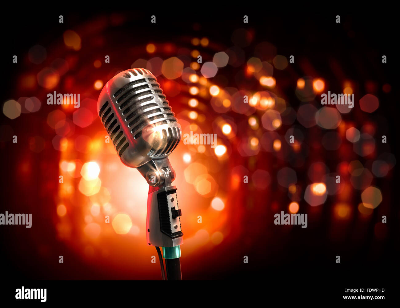 Single retro microphone against colourful background with lights Stock ...