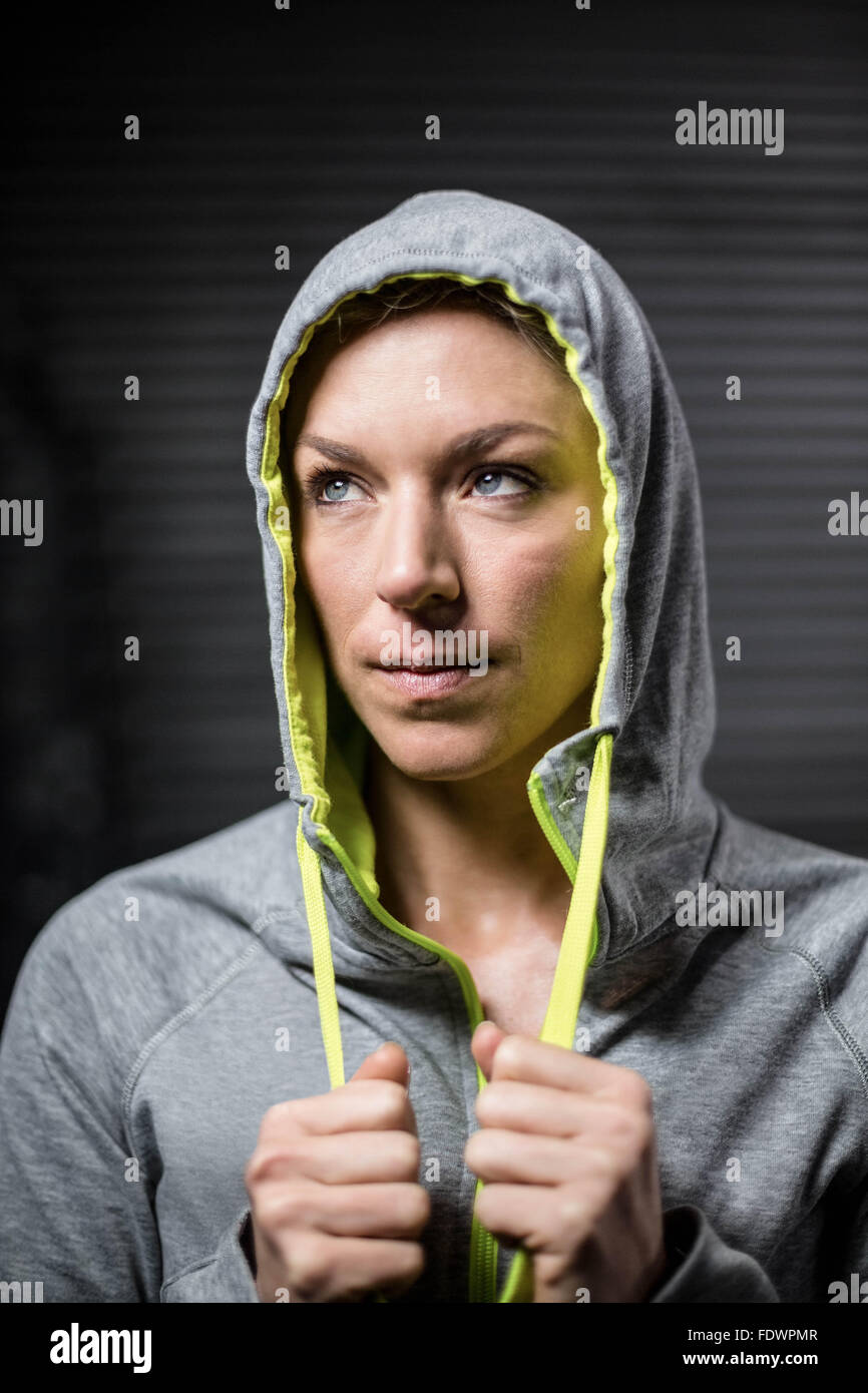 Portrait of woman wearing hood Stock Photo - Alamy