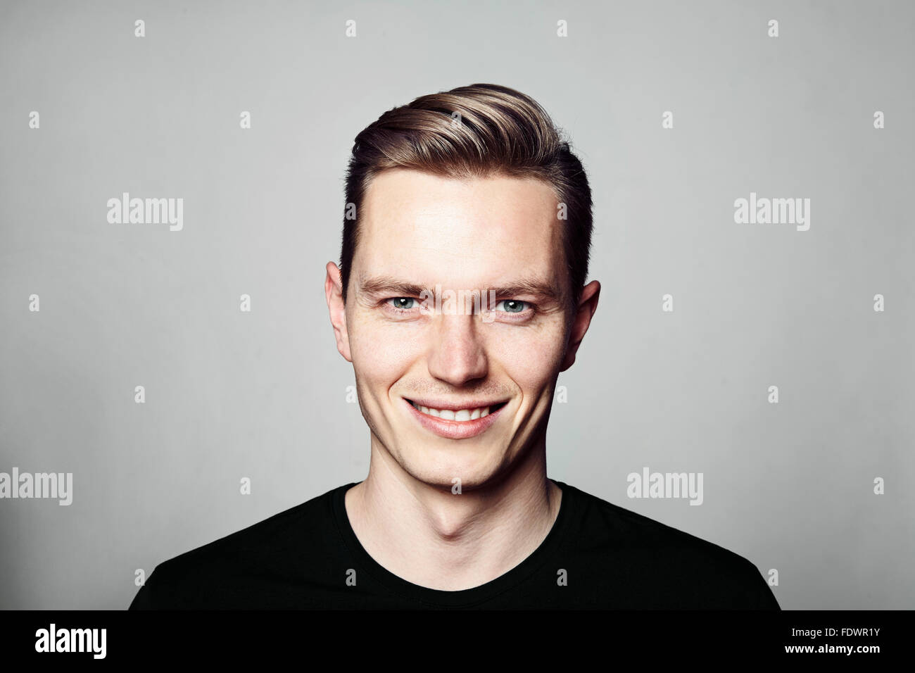 Studio shot of young handsome man. Isolated on white background ...