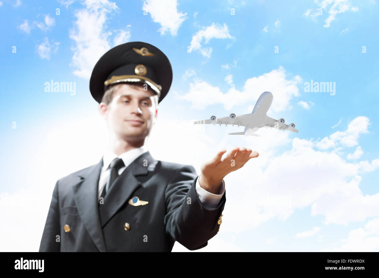 Image of pilot with airplane taking off from his hand Stock Photo - Alamy