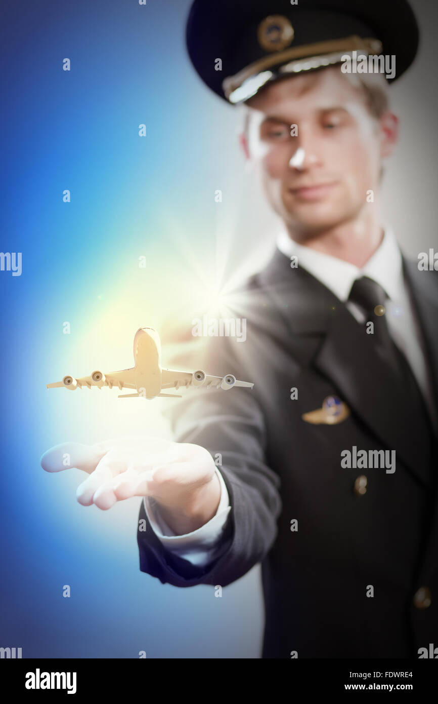 Image of pilot with airplane taking off from his hand Stock Photo - Alamy