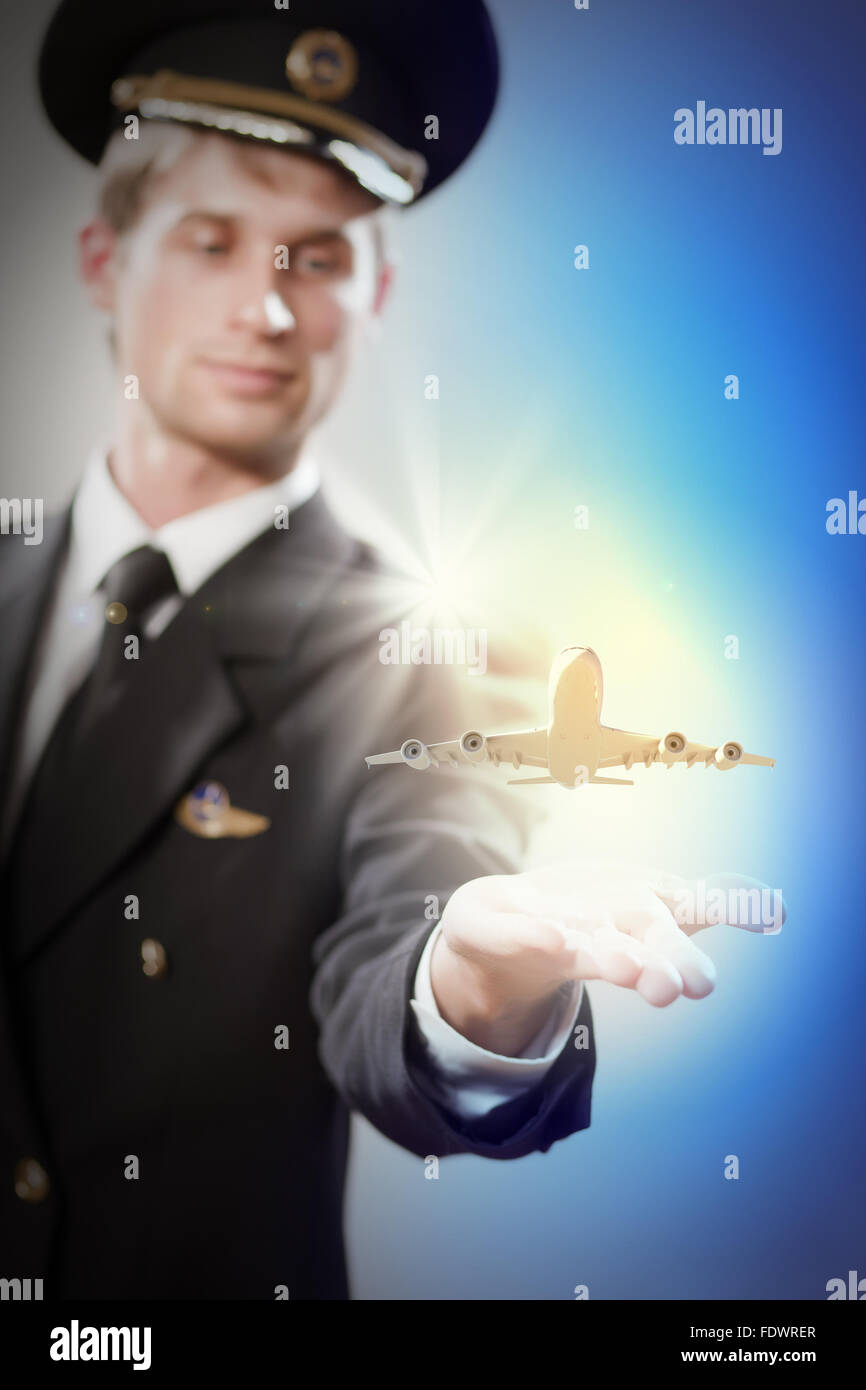 Image of pilot with airplane taking off from his hand Stock Photo - Alamy