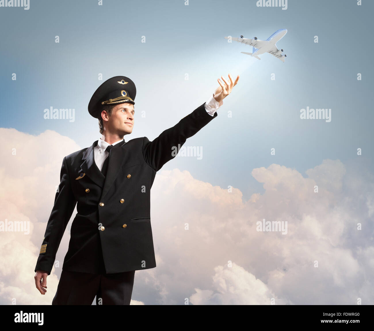 Image of pilot touching sky against airplane background Stock Photo - Alamy