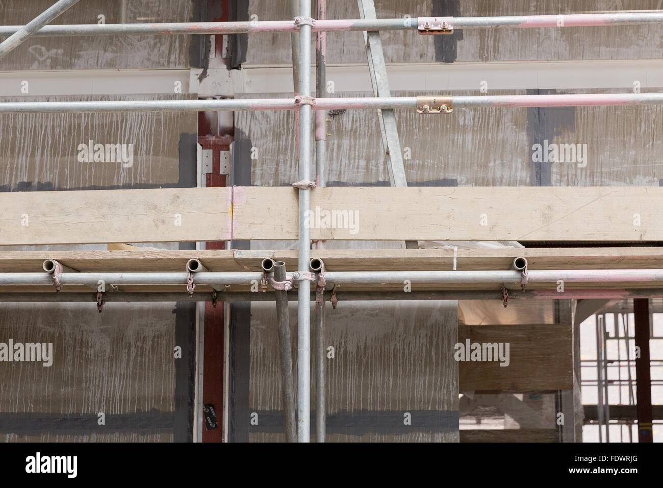 A construction site with concrete slabs built held together with ...