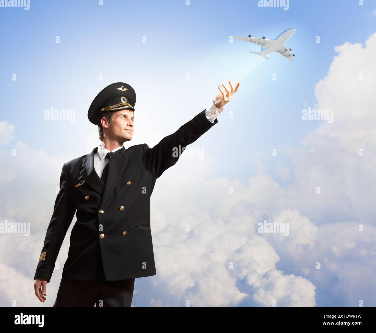 Image of pilot touching sky against airplane background Stock Photo - Alamy