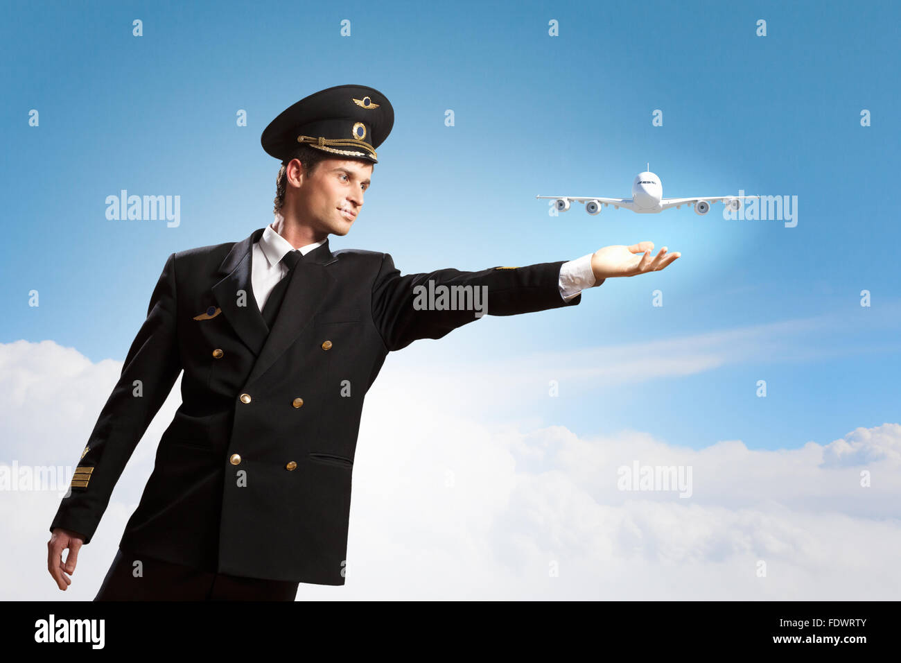 Image of pilot touching sky against airplane background Stock Photo - Alamy