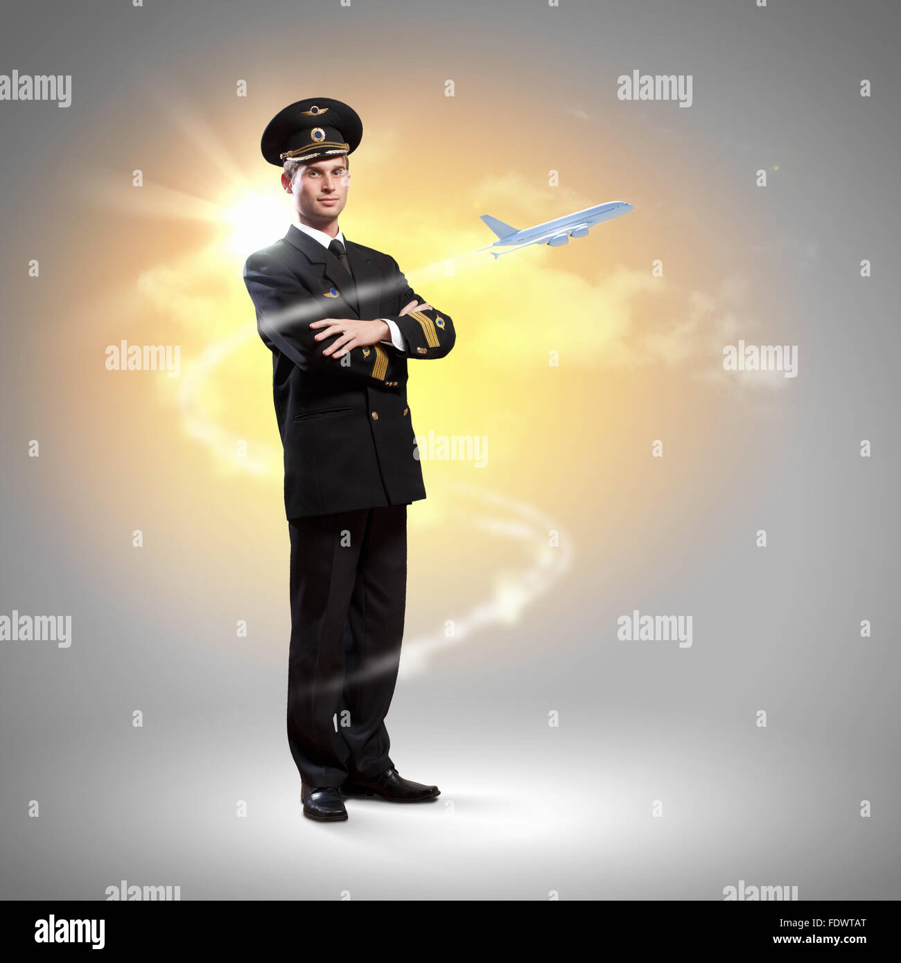 Image of male pilot with airplane flying around him Stock Photo - Alamy