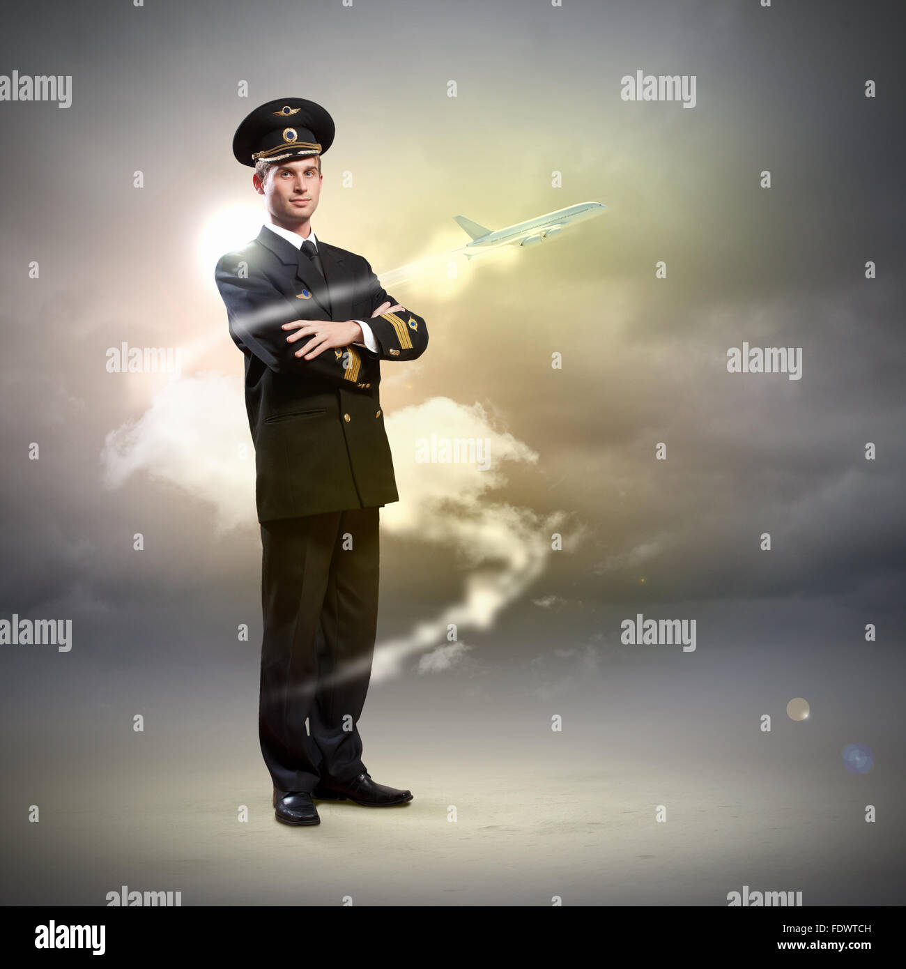 Image of male pilot with airplane flying around him Stock Photo - Alamy