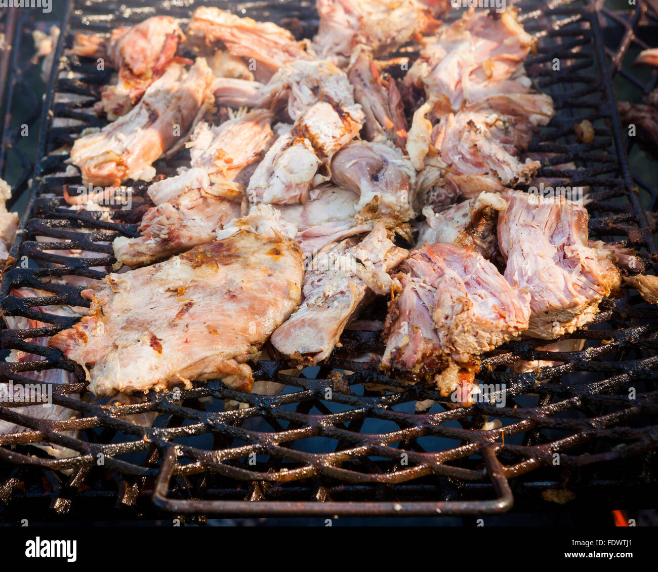 Pork meat grilled in open fire Stock Photo - Alamy