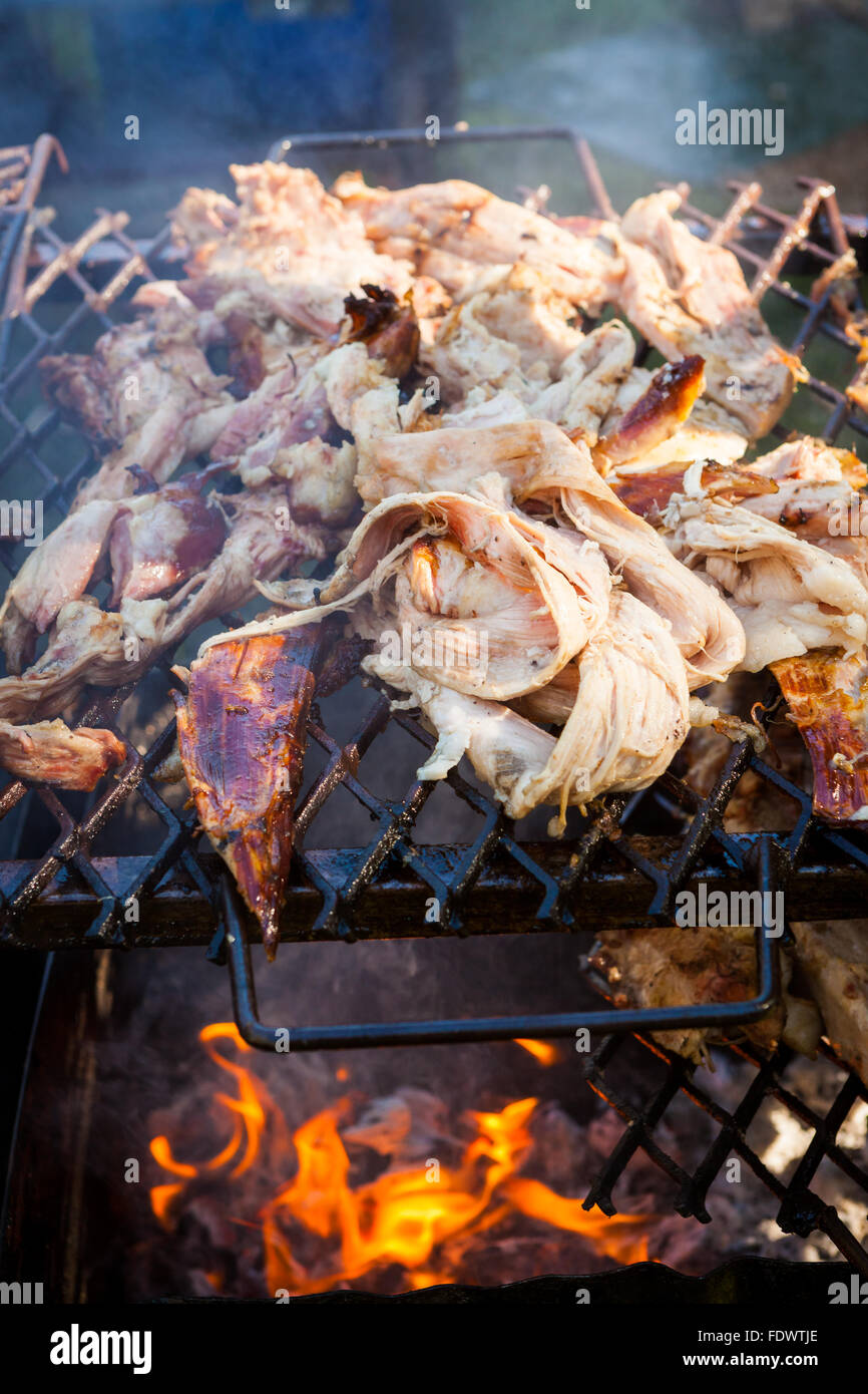 Pork meat grilled in open fire Stock Photo - Alamy