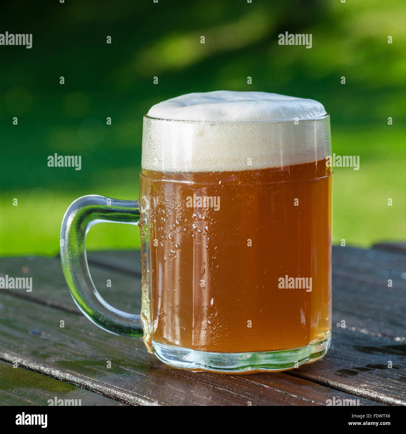 german chilled cold beer in garden Stock Photo - Alamy