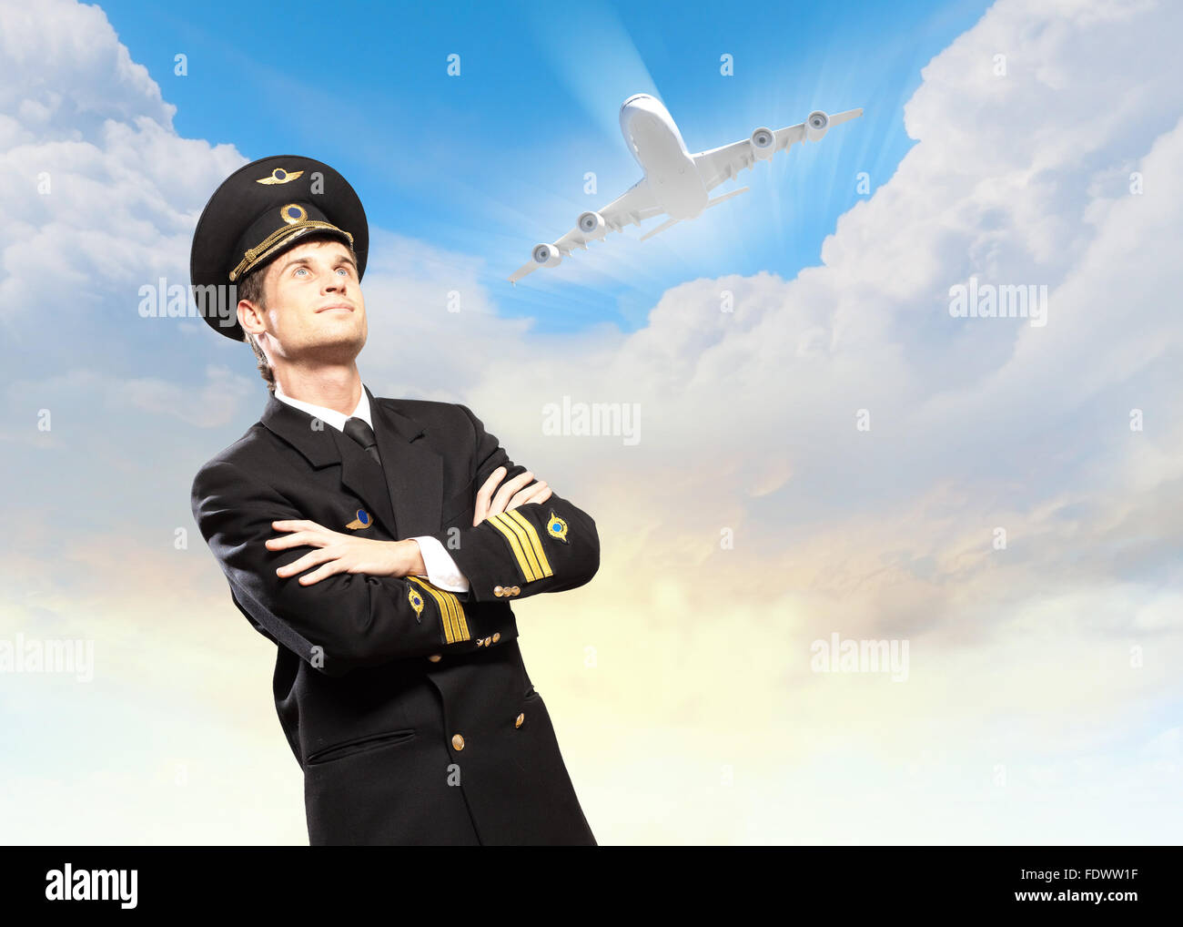 Image of male pilot with airplane at background Stock Photo - Alamy
