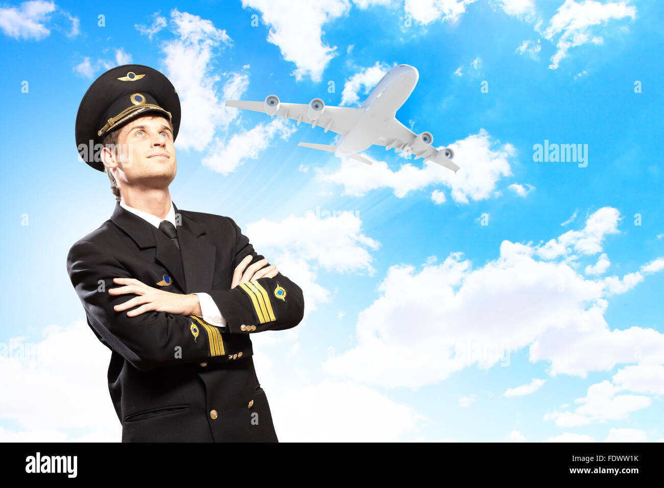 Image of male pilot with airplane at background Stock Photo - Alamy