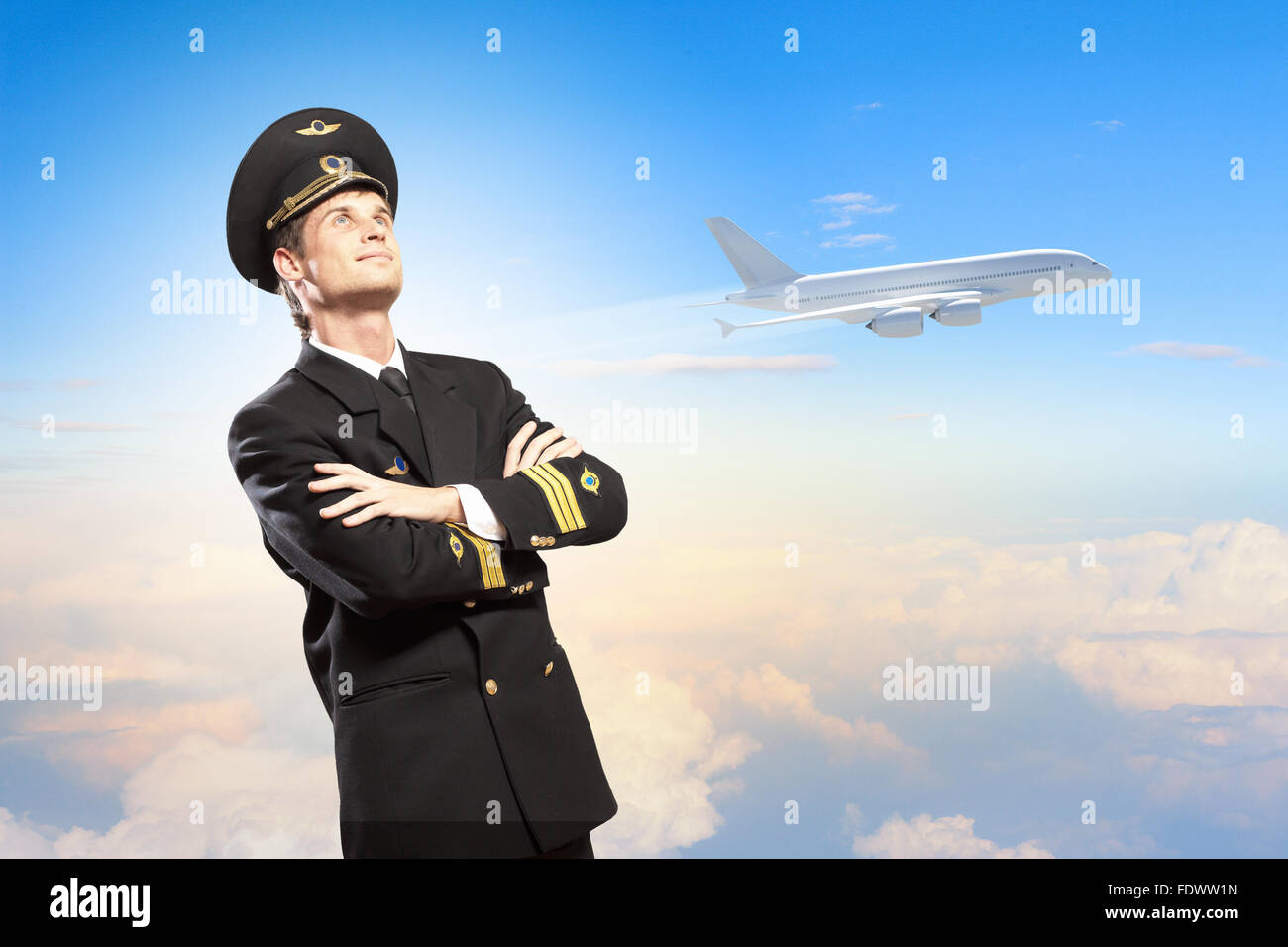 Image of male pilot with airplane at background Stock Photo - Alamy