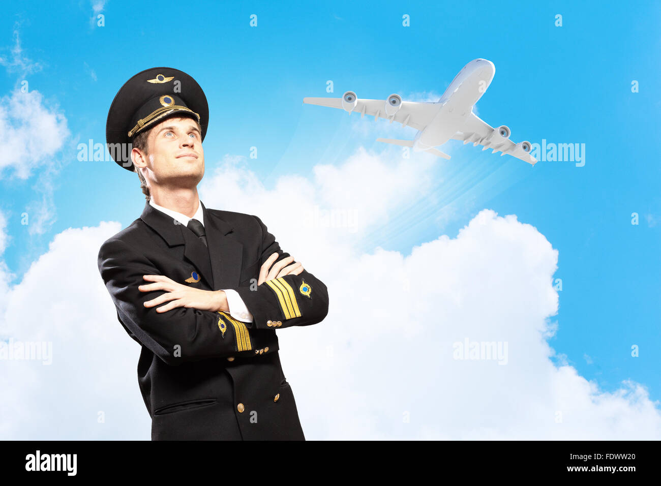 Image of male pilot with airplane at background Stock Photo - Alamy