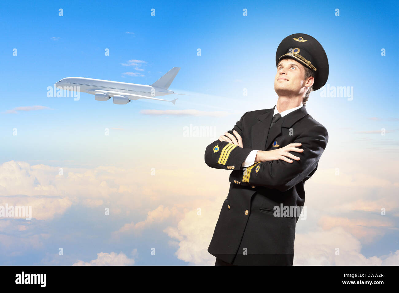 Image of male pilot with airplane at background Stock Photo - Alamy