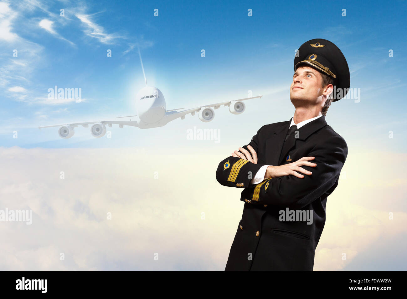 Image of male pilot with airplane at background Stock Photo - Alamy