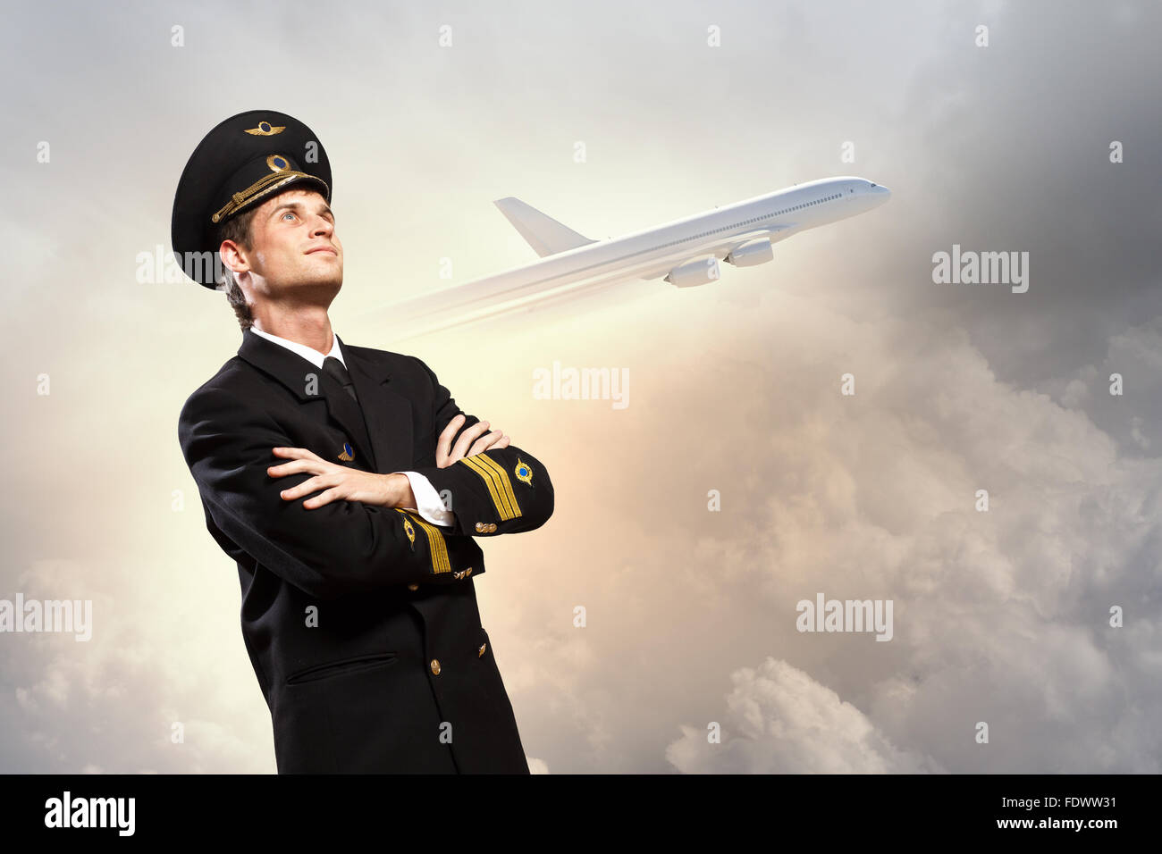 Image of male pilot with airplane at background Stock Photo - Alamy