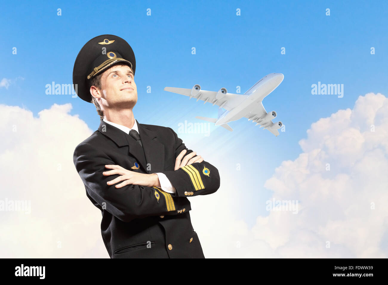 Image of male pilot with airplane at background Stock Photo - Alamy