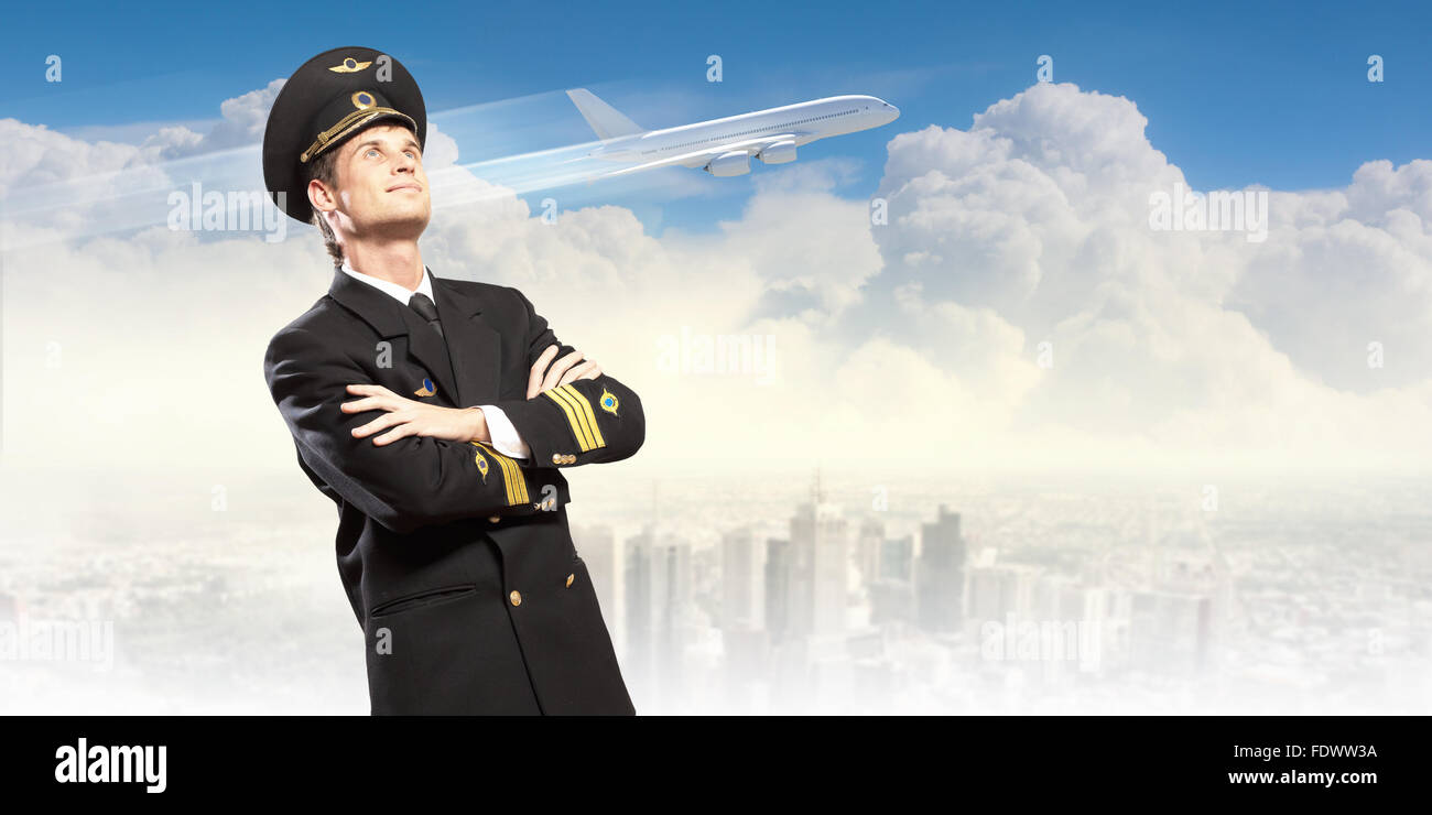 Image of male pilot with airplane at background Stock Photo - Alamy