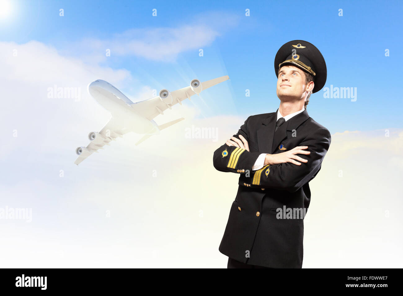 Image of male pilot with airplane at background Stock Photo - Alamy