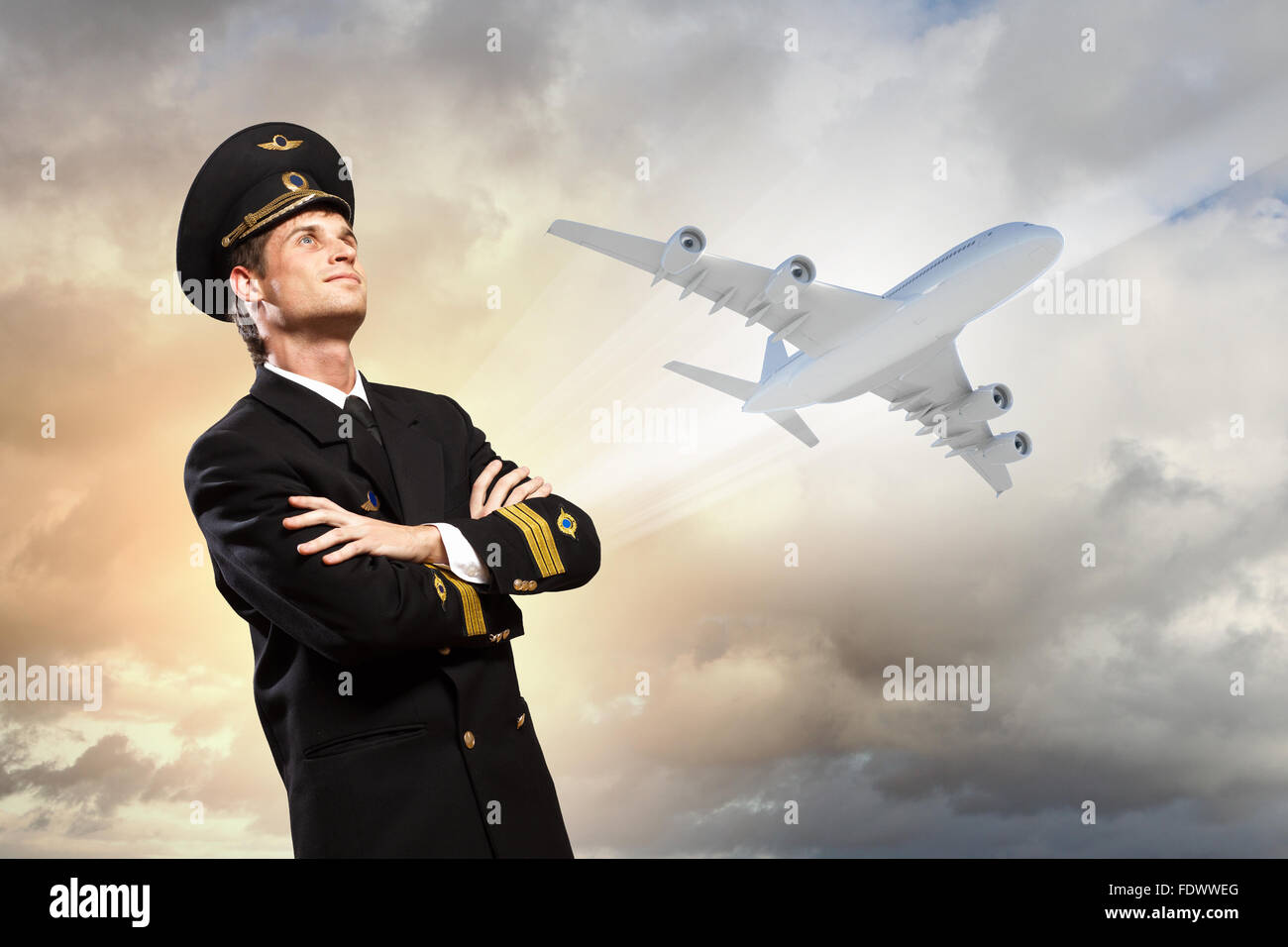 Image of male pilot with airplane at background Stock Photo - Alamy