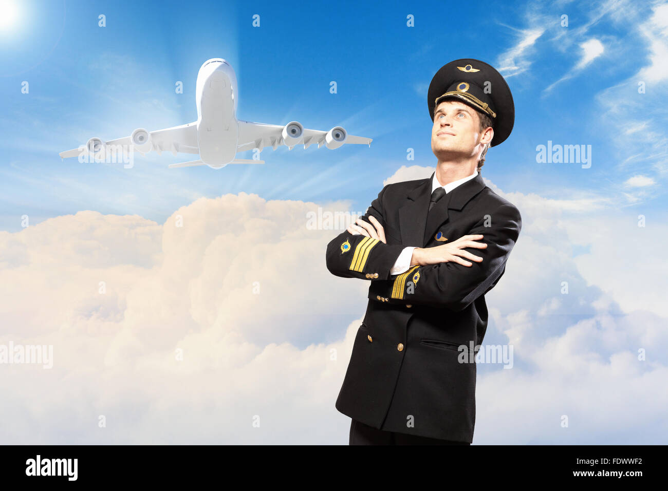 Image of male pilot with airplane at background Stock Photo - Alamy