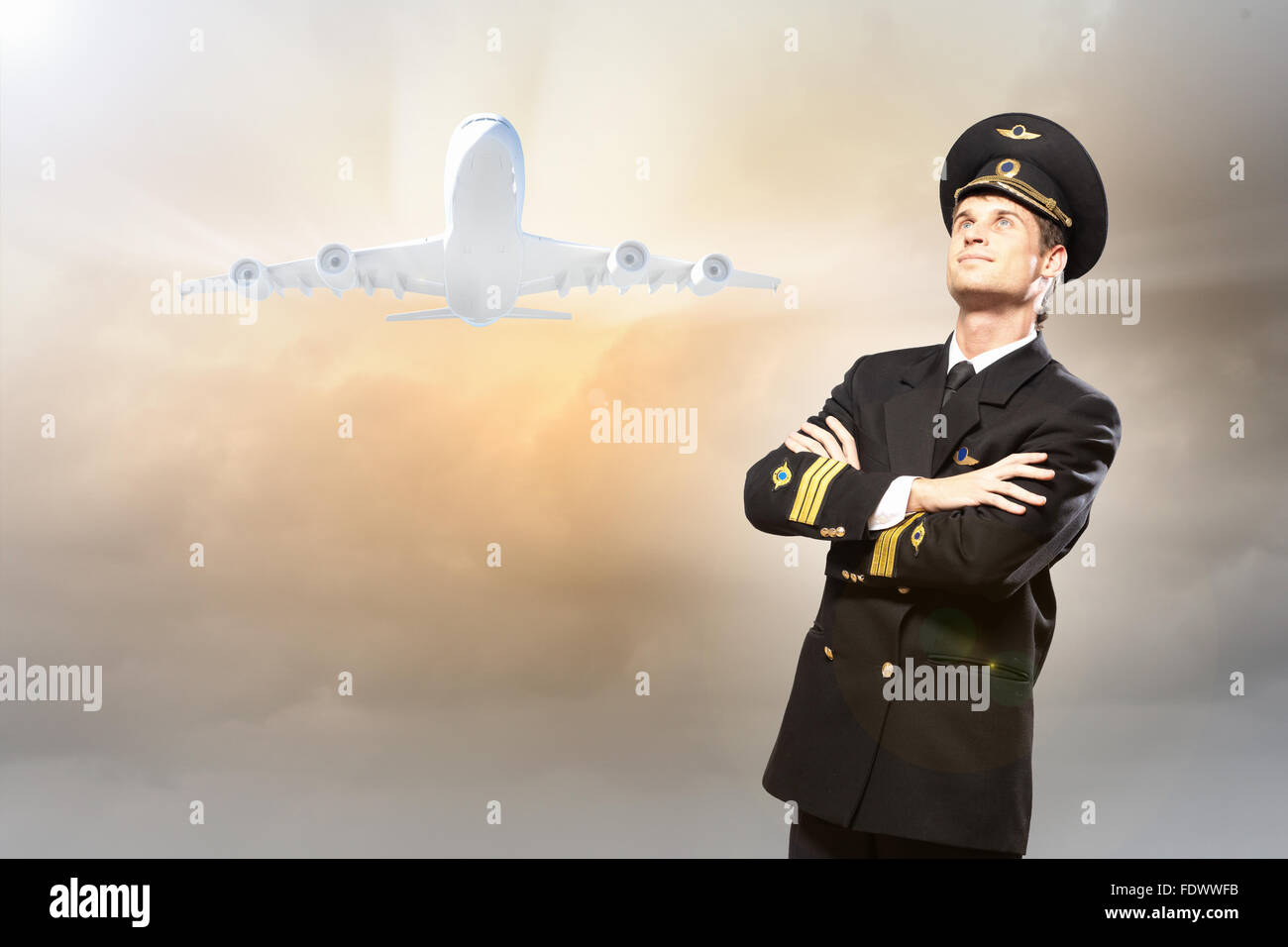 Image of male pilot with airplane at background Stock Photo - Alamy