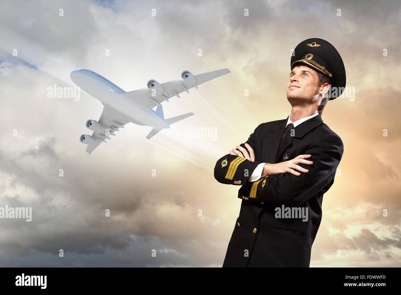 Image of male pilot with airplane at background Stock Photo - Alamy