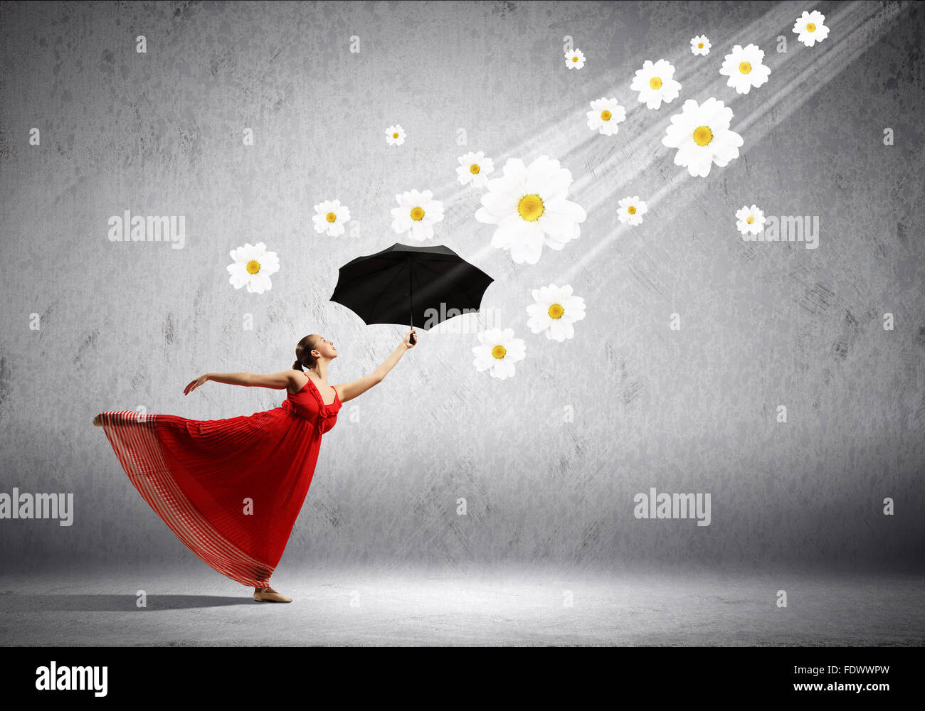 ballet dancer in flying satin dress with umbrella and flowers Stock ...