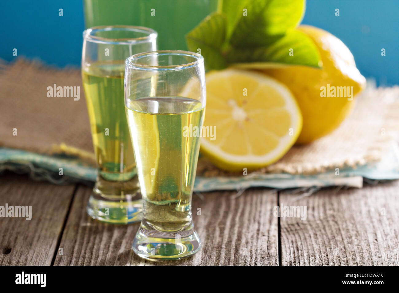 Homemade lemon liquor Limoncello in small shots Stock Photo - Alamy