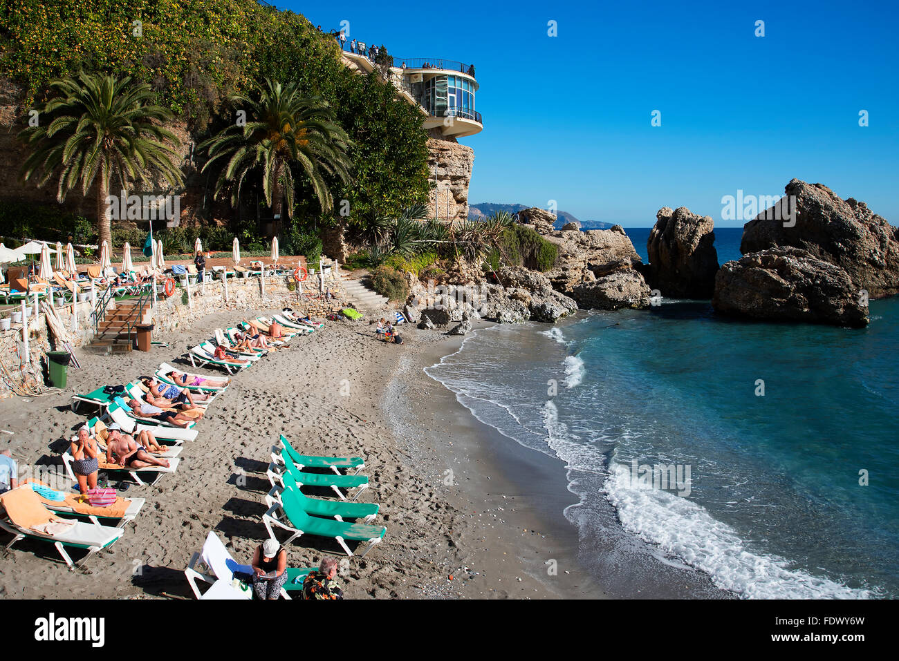 Beach scenes in Nerja, a sleepy Spanish Holiday resort on the Costa Del ...