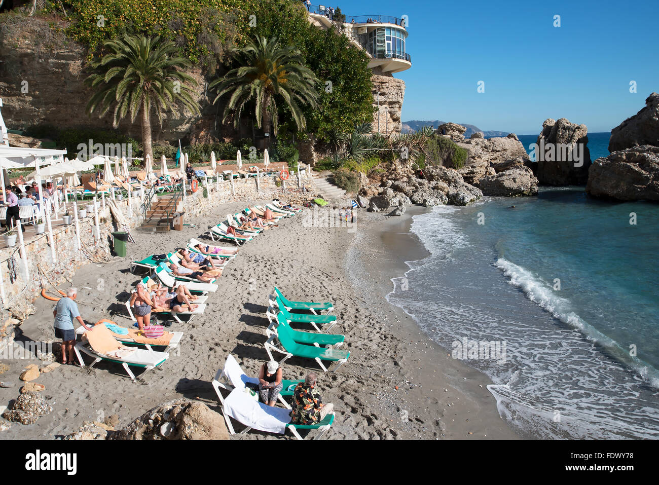Beach scenes in Nerja, a sleepy Spanish Holiday resort on the Costa Del ...