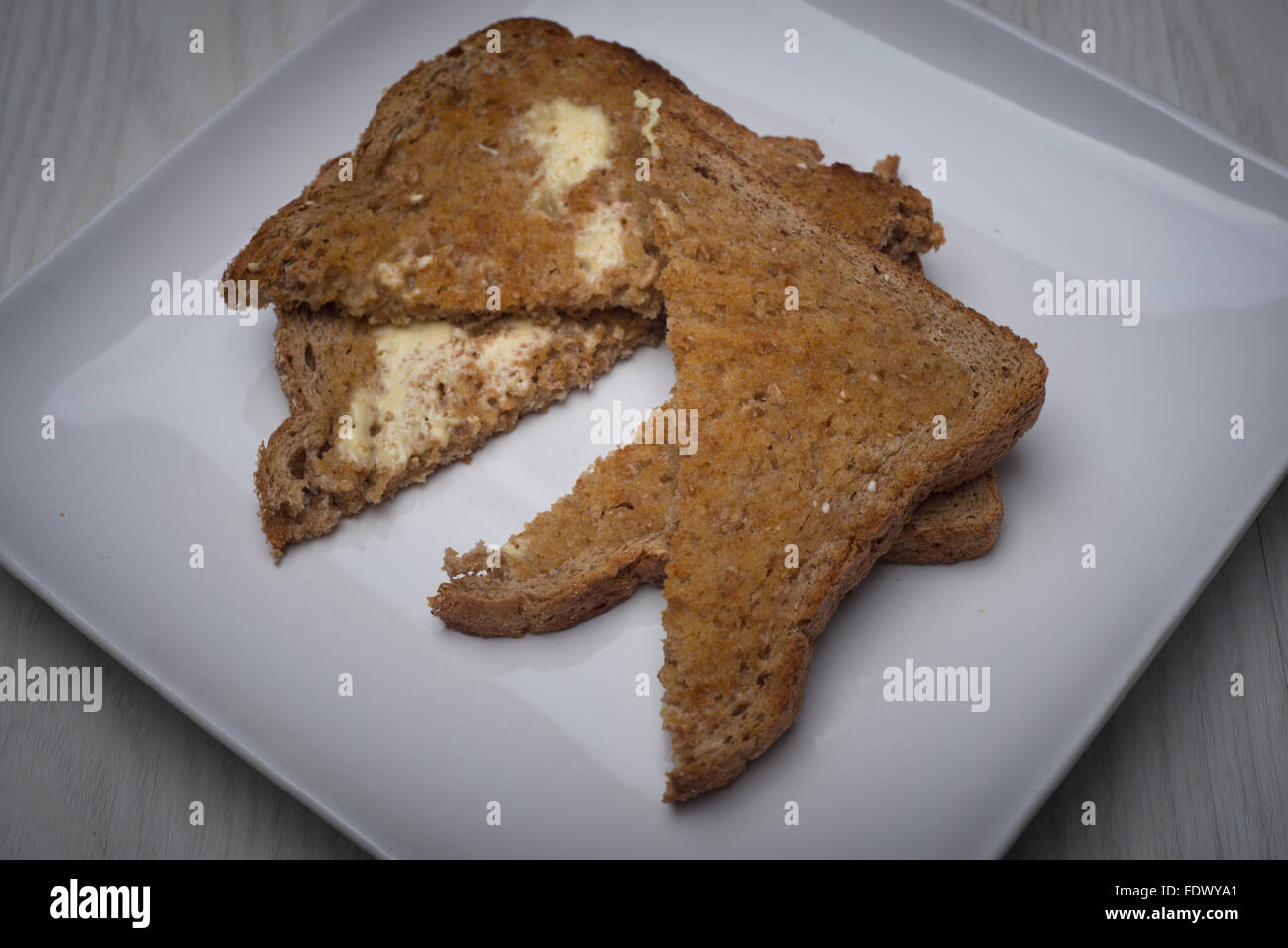 Two slices toast butter hi-res stock photography and images - Alamy