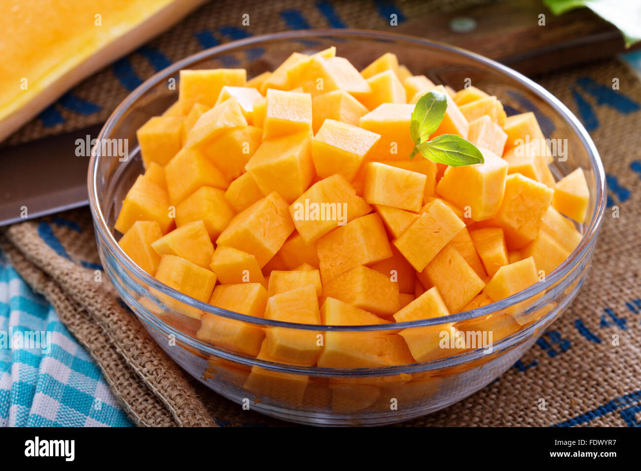 Diced butternut squash in a bowl ready for cooking Stock Photo - Alamy