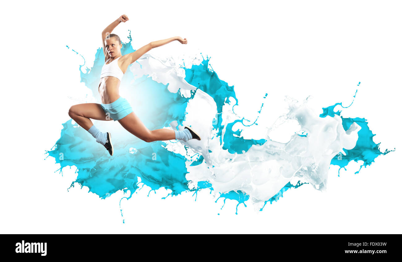 Image of sport girl in jump against color splashes background Stock ...