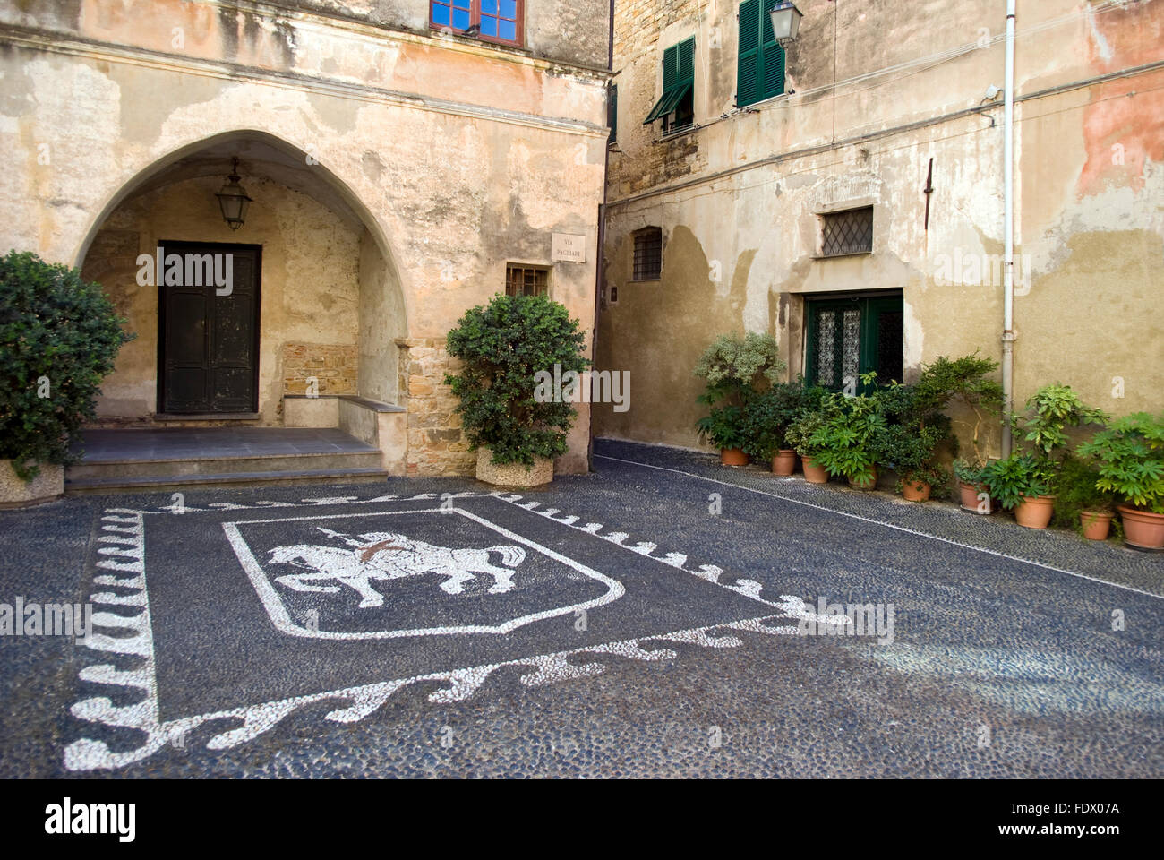 Italian handmade cobblestone pavement in ancient small square Stock ...