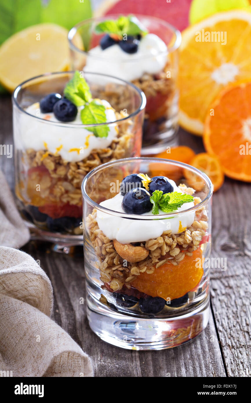 Breakfast parfait with citrus compote, granola, yoghurt and blueberry ...