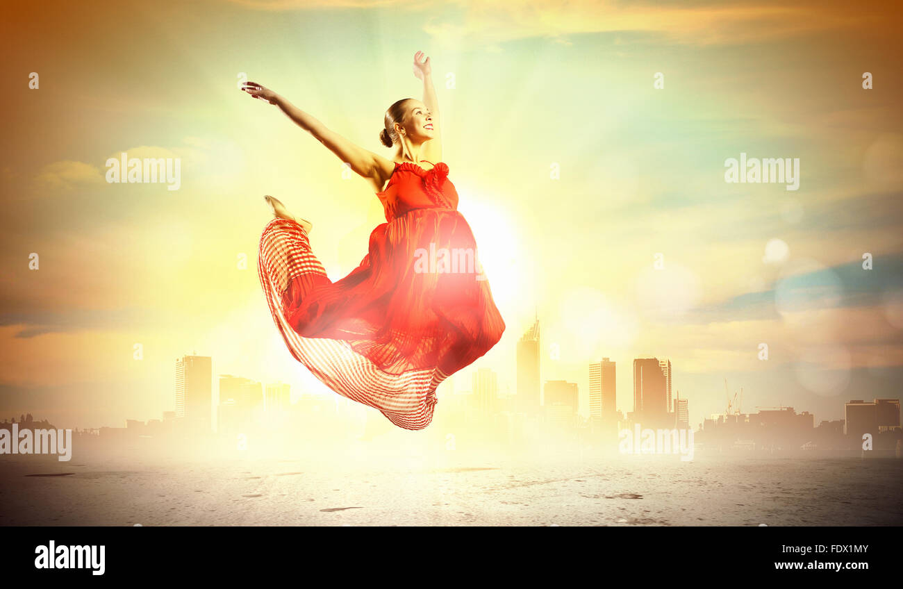 Image of female ballet dancing outdoor against city background Stock ...
